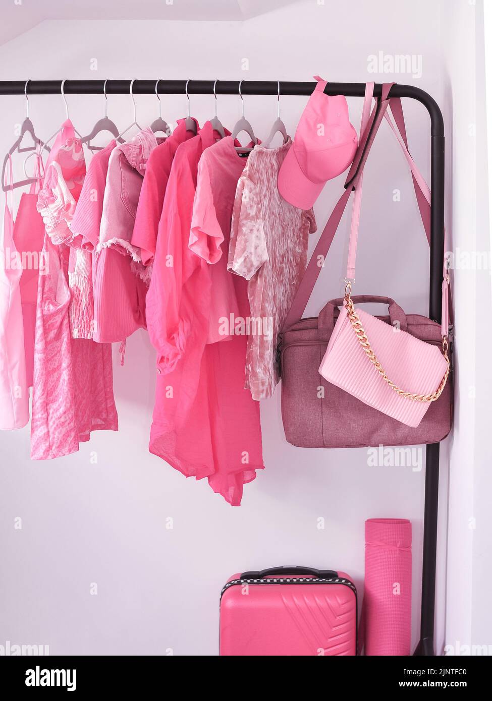 Pink woman's clothes in fitting room ,summer and spring look for girls ...