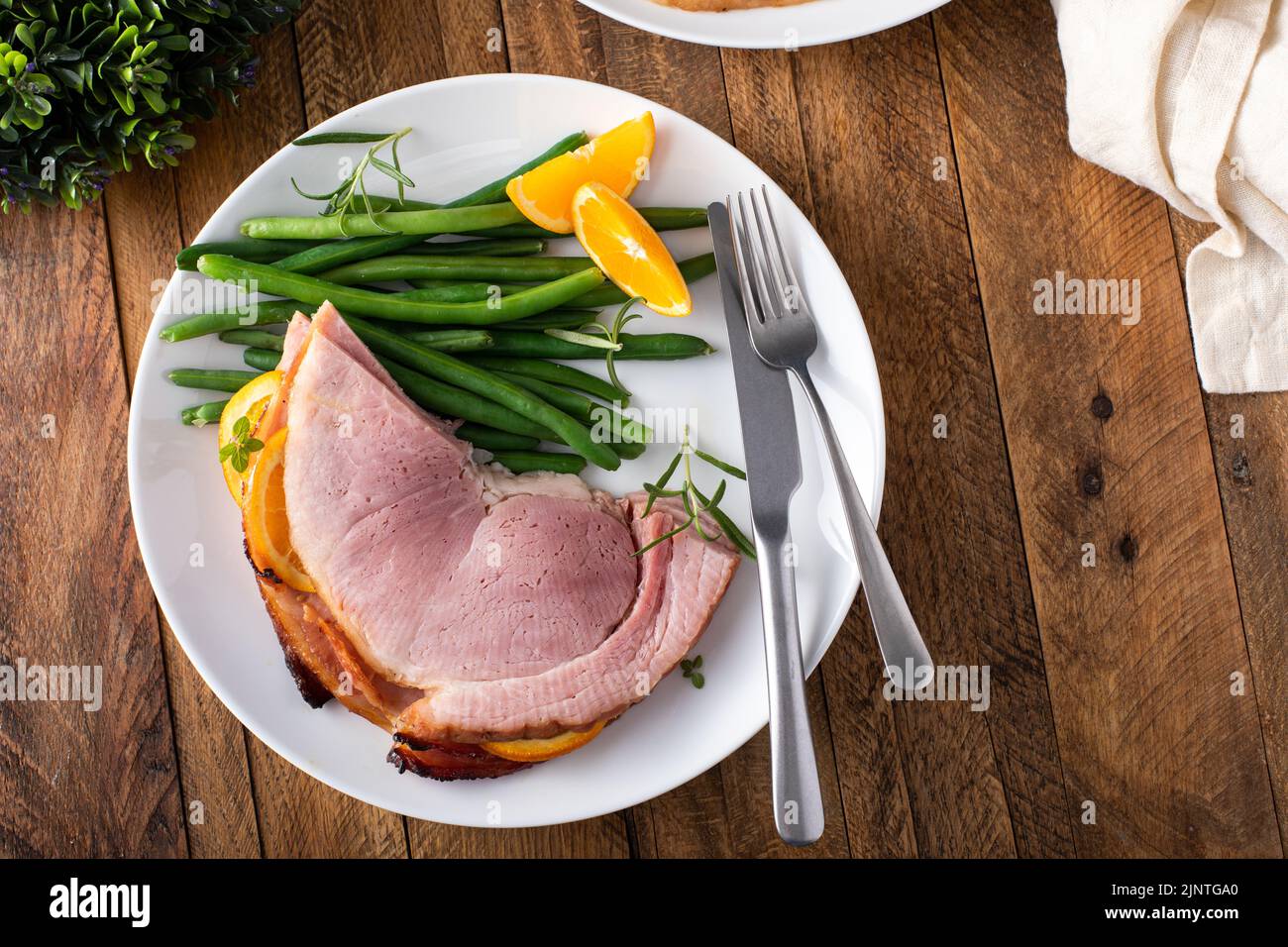 Christmas or Thanksgiving spiral sliced ham with oranges and herbs ...