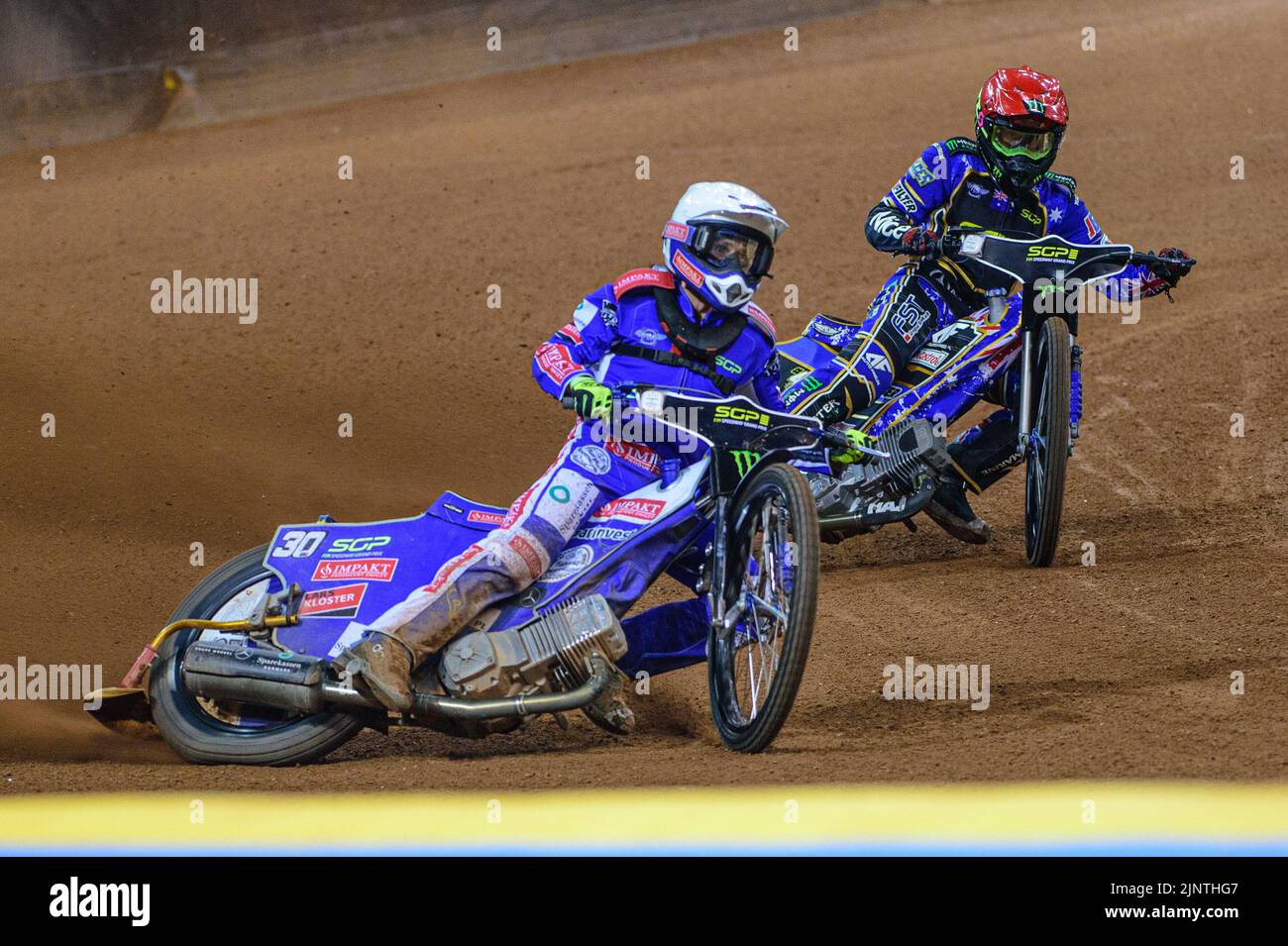 Leon Madsen (30) (White) leads Jack Holder (25) (Red) during the FIM ...