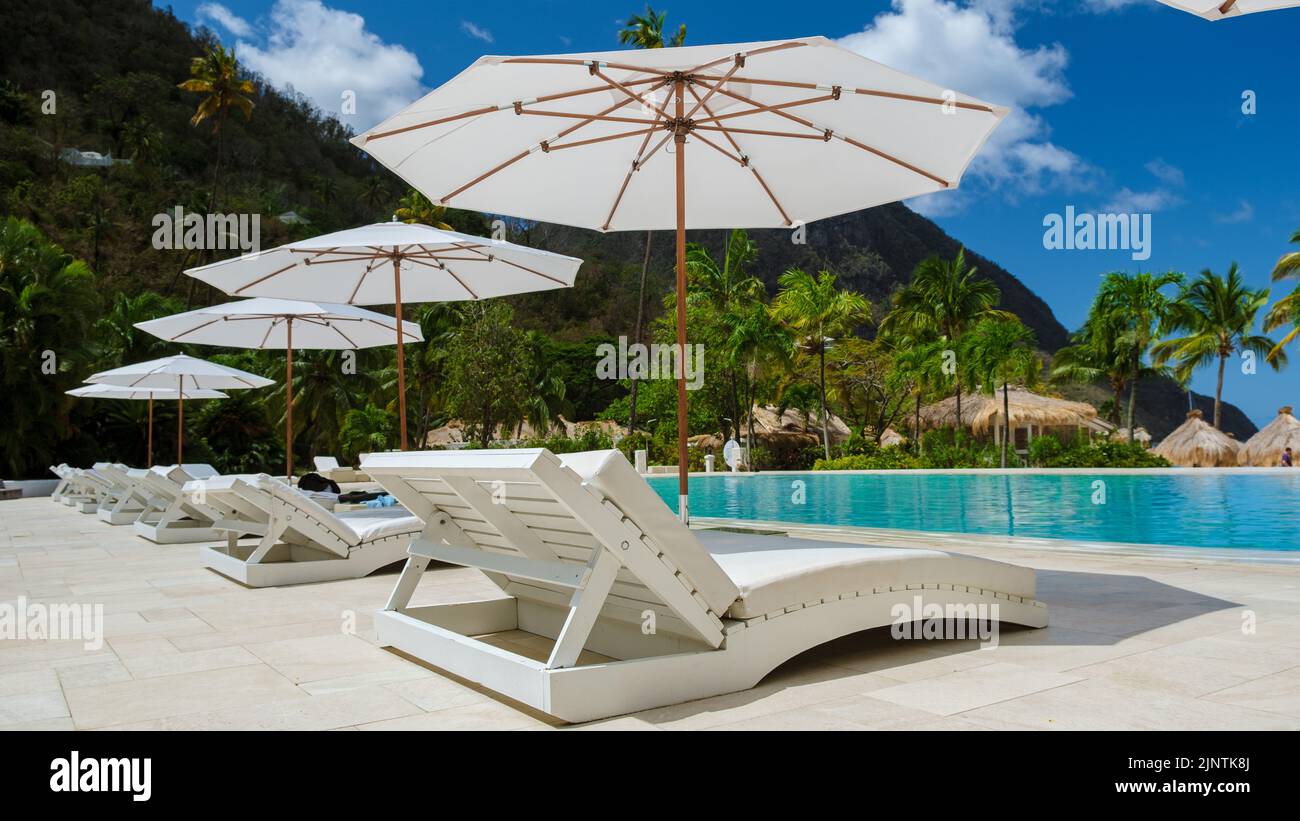 Sugar beach Saint Lucia, is a public white tropical beach with palm ...
