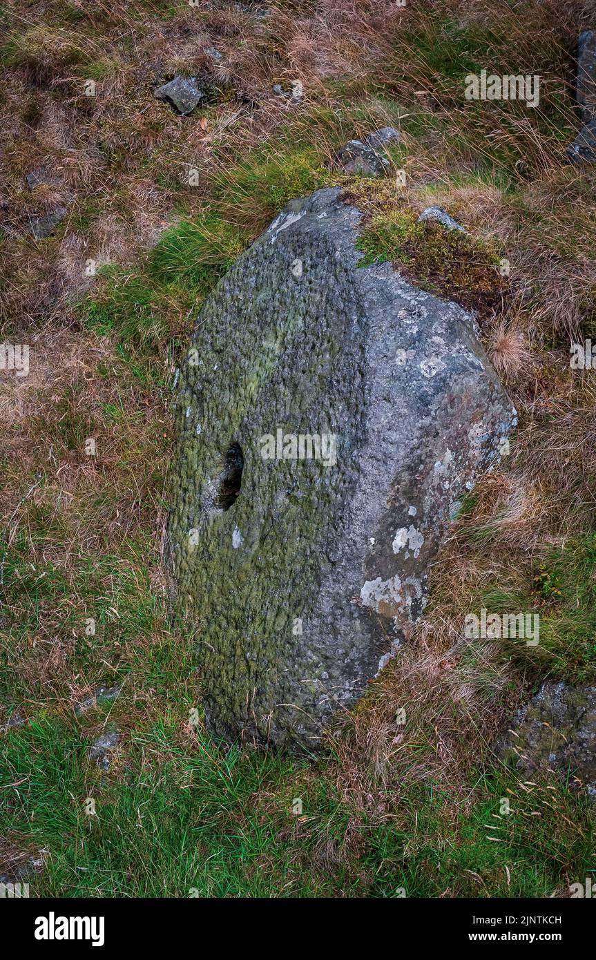 Half-buried hand-carved millstone abandoned at Dobb Edge Quarry near ...