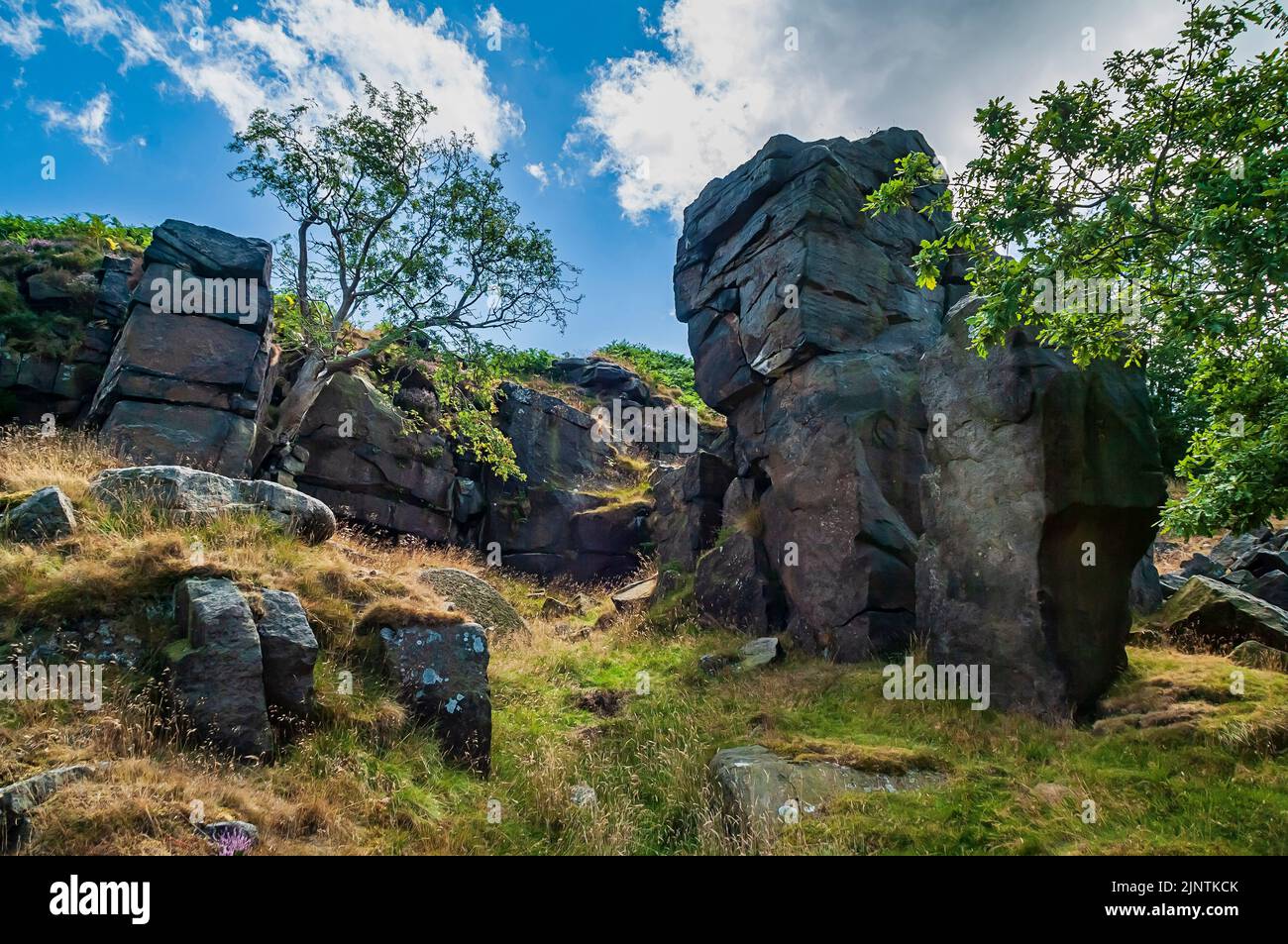 Large pillar of gritstone rock left unquarried at Dobb Edge Quarry near ...