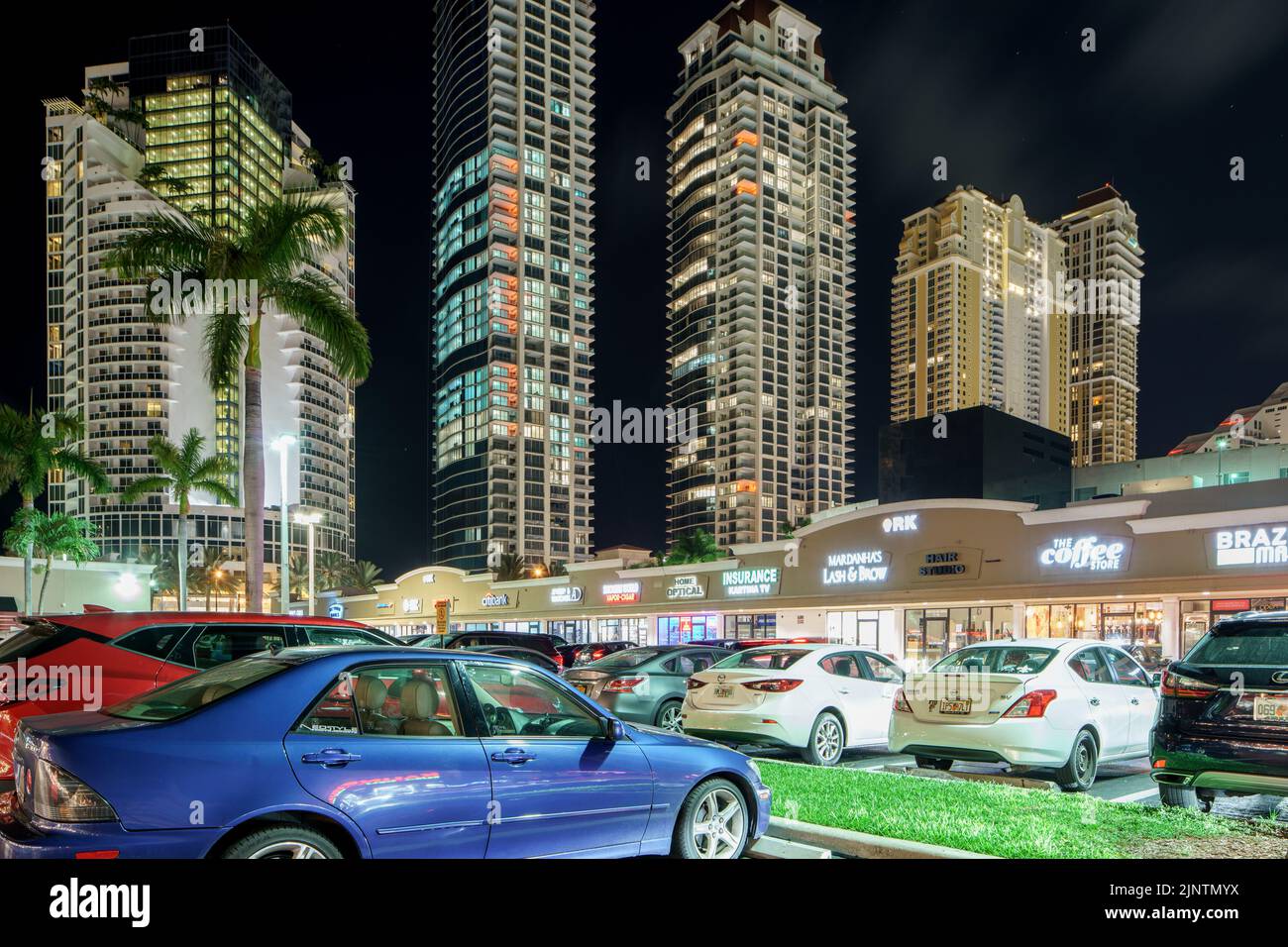 Sunny Isles Beach, FL, USA - August 1, 2022: Night photo shopping plaza ...