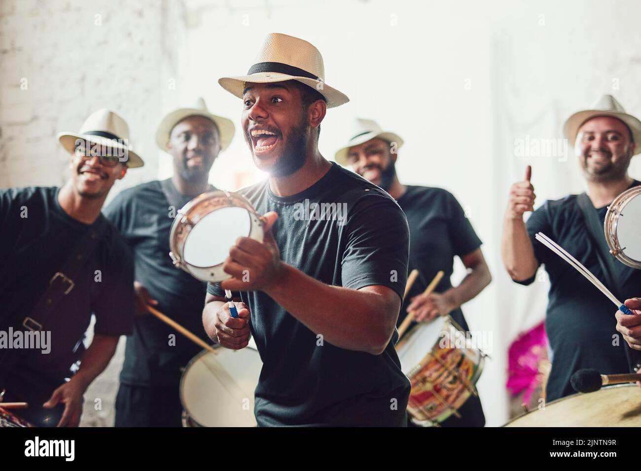 Lets groove the day away. a group of musical performers playing drums ...