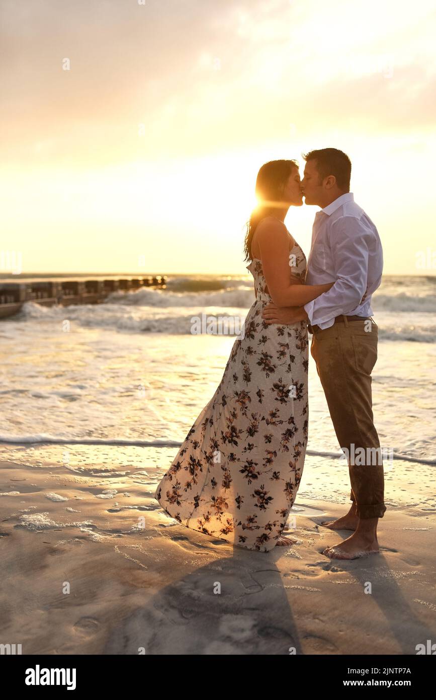 Moments like these. Full length shot of an affectionate young couple ...