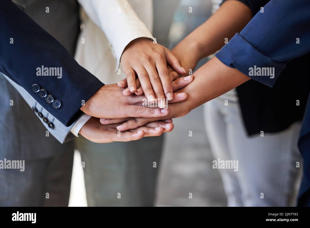 Dedicated to getting further as a team. Closeup shot of a group of ...