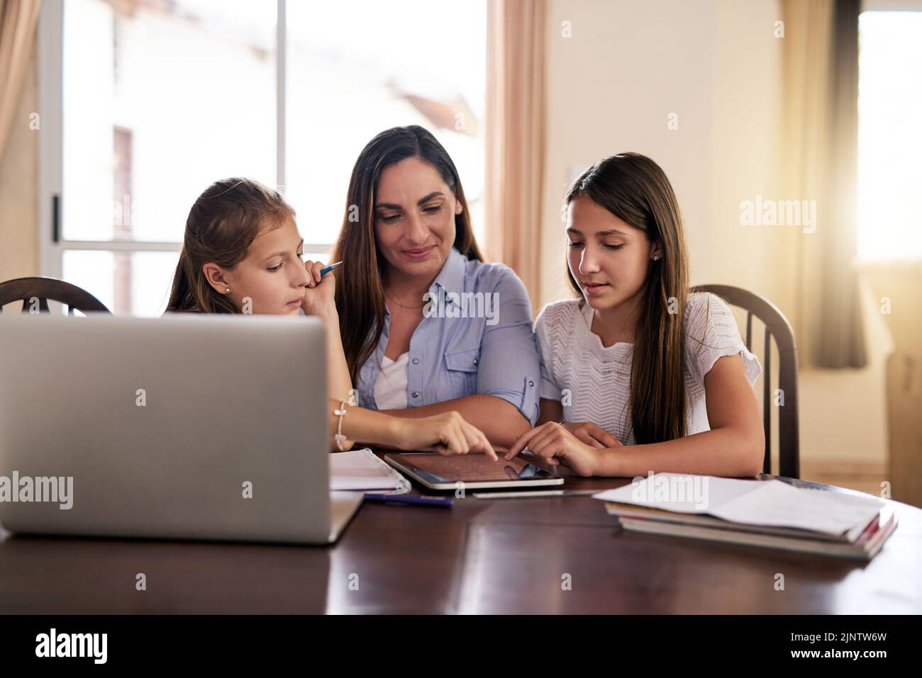 Do the two of you understand now. two cheerful young girls doing ...