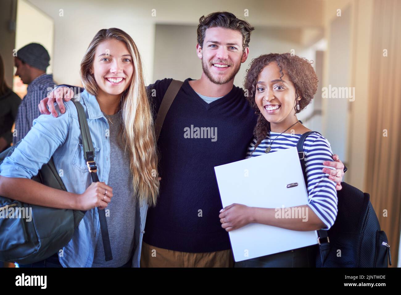 We realize the power behind a good education. Portrait of a group of ...