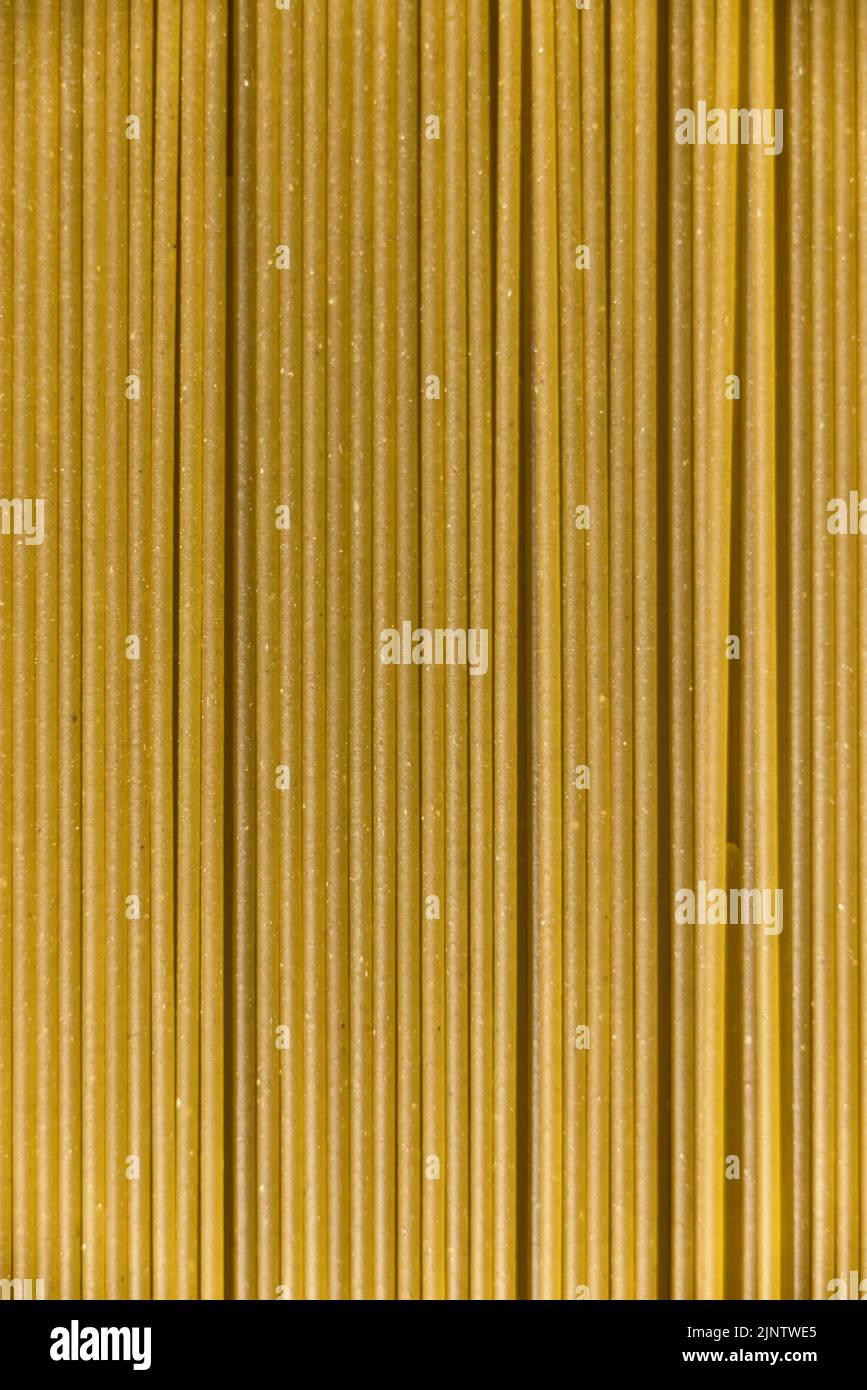 Italian healthy food background, raw spinach spaghetti filling the ...