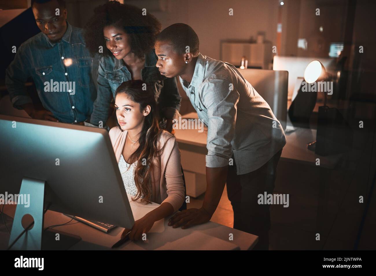 Combining their creativity. a group of young designers working together ...