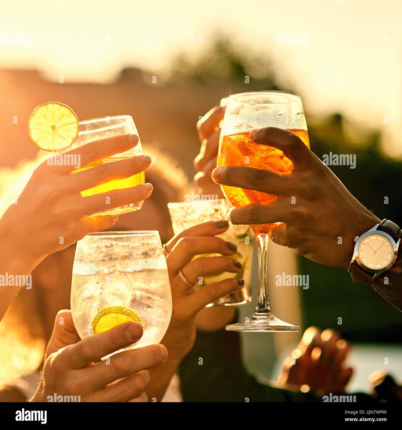 Time to enjoy and have fun. Closeup shot of a group of unrecognizable ...