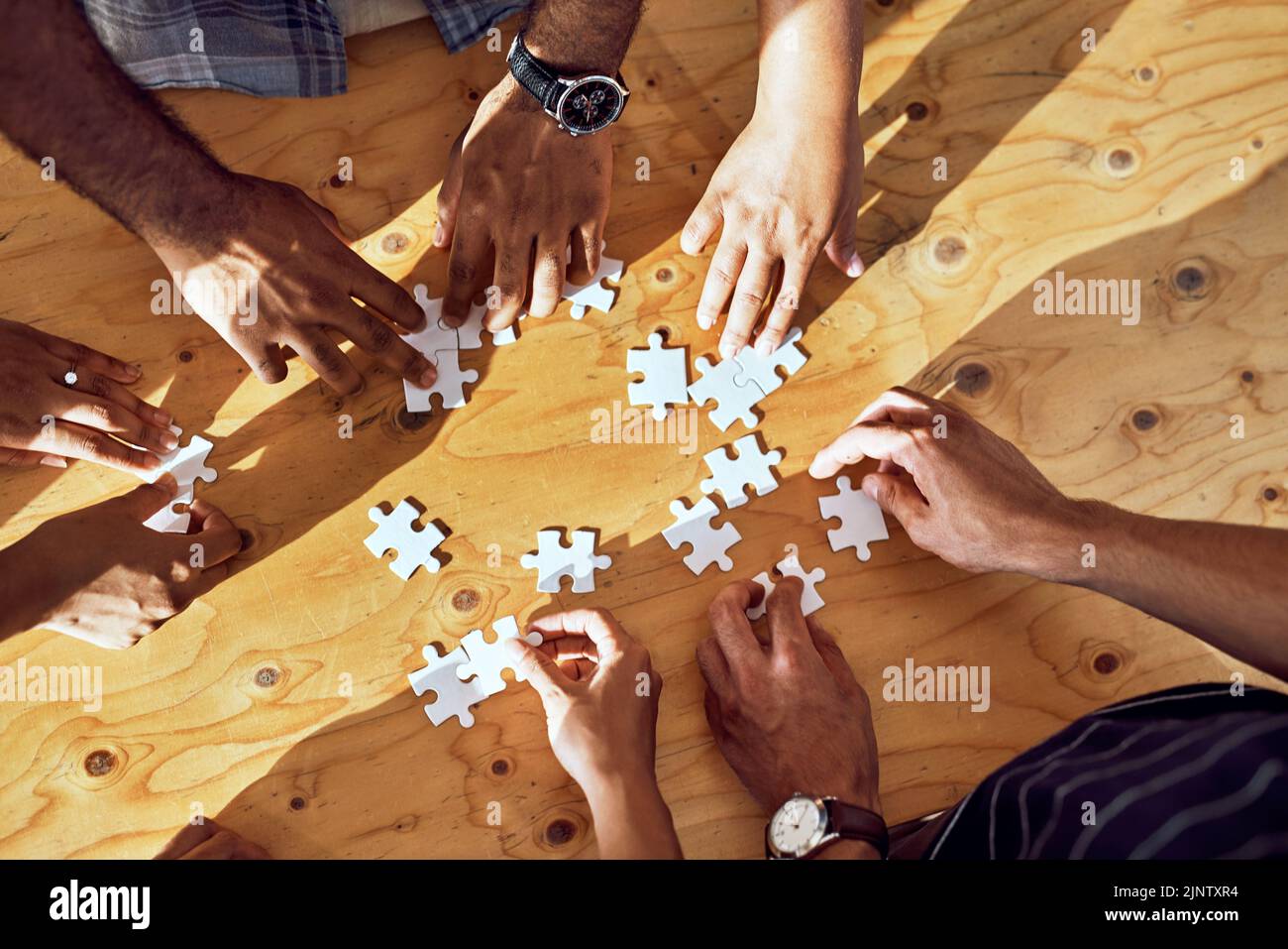 Synergy forms the solutions we need. Closeup shot of an unrecognizable ...