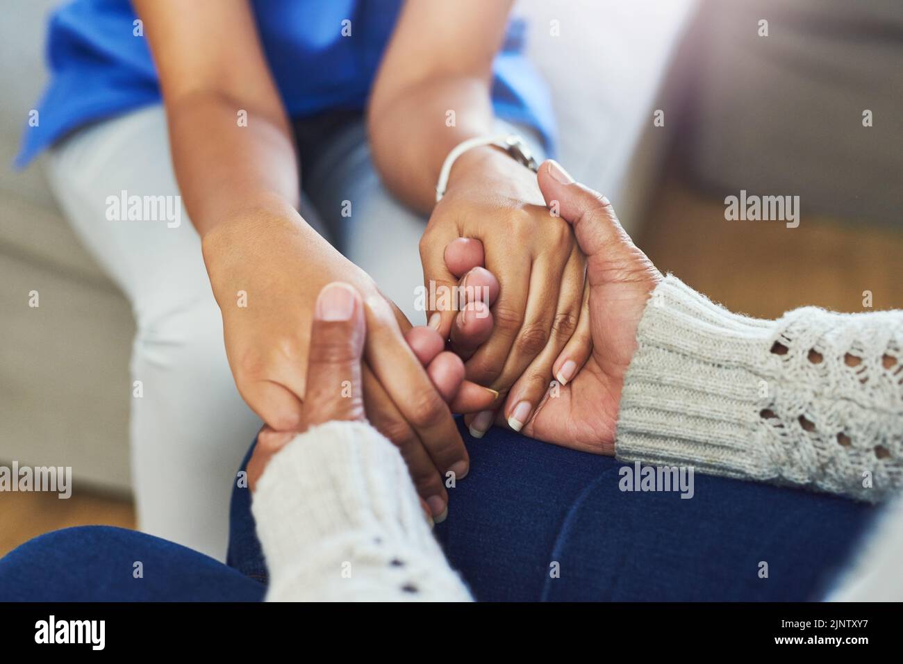 Just hold on a little longer. an unrecognizable female nurse holding a ...