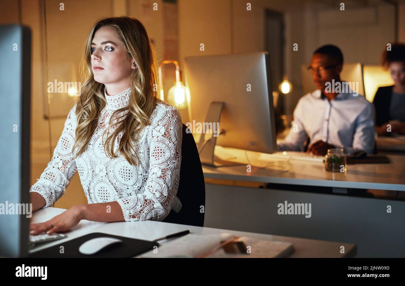 Success Sometimes Means Working The Late Shift A Young Businesswoman Working Late On A Computer