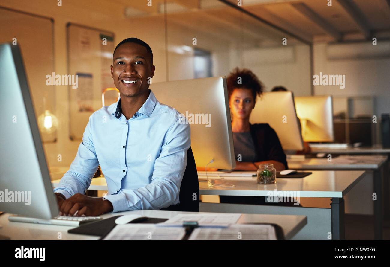 Success is dependent on your efforts. Portrait of a young businessman ...