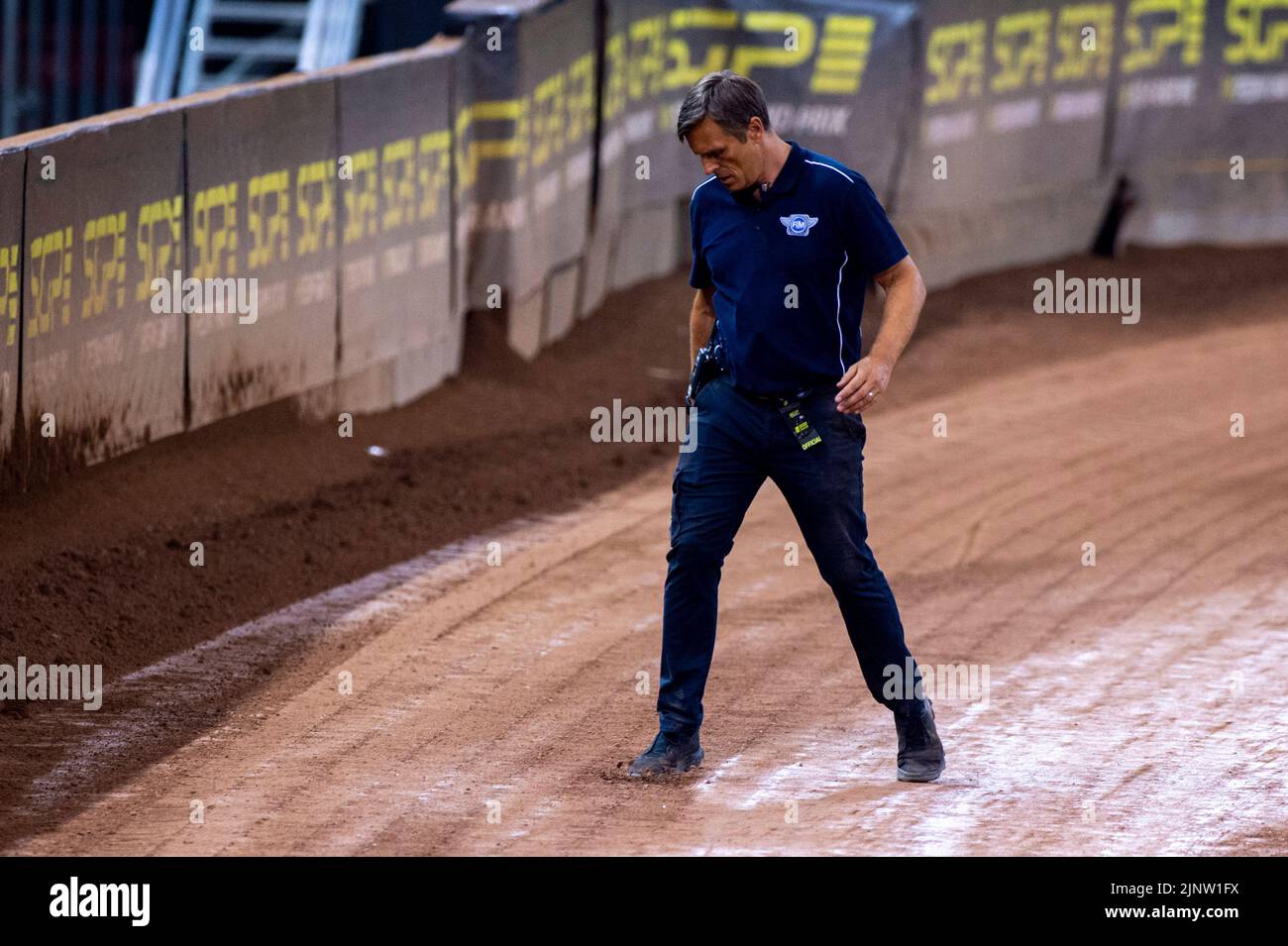 FIM Race Director Phil Morris checks the track during the FIM Speedway ...