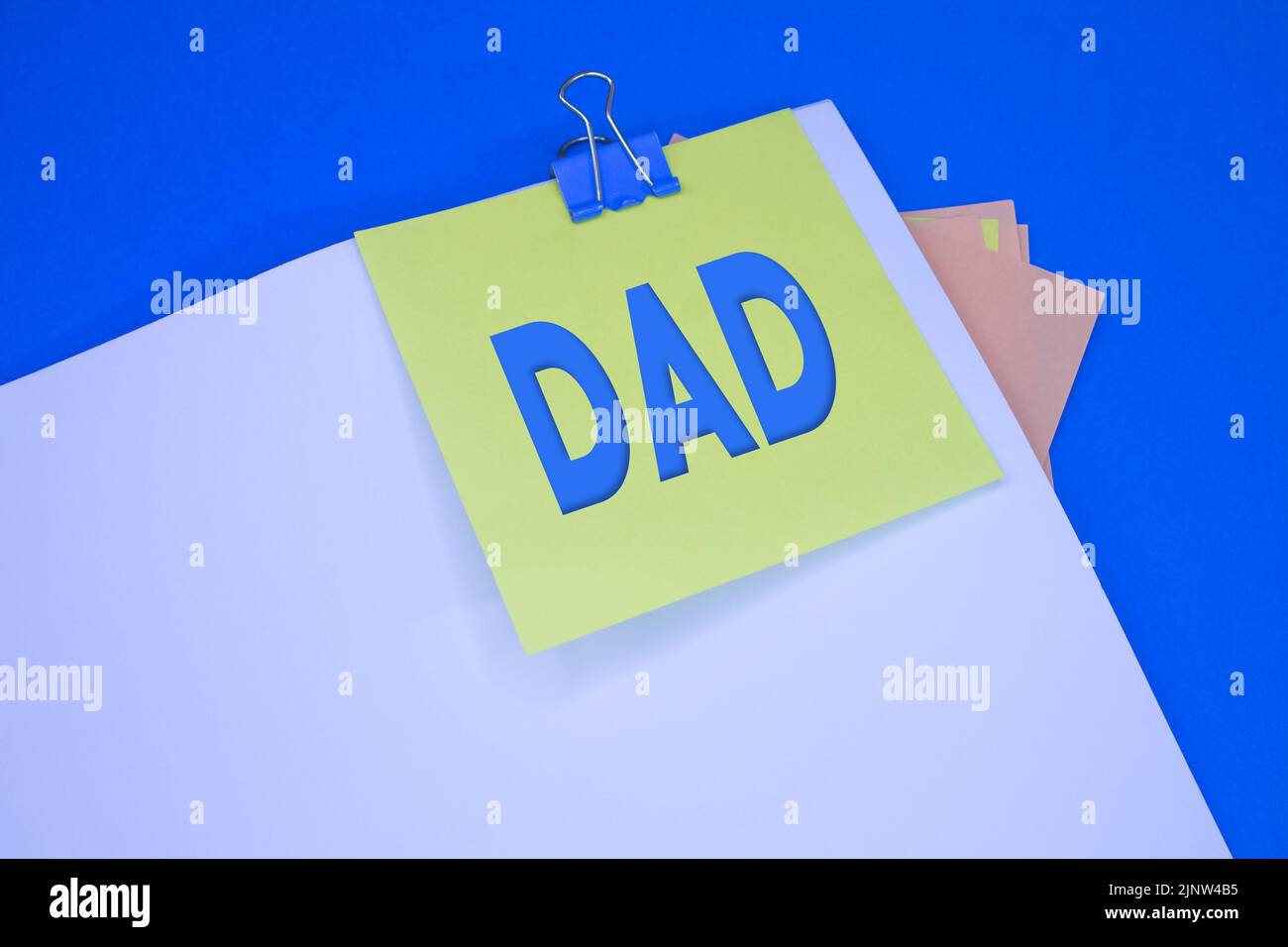Dad. Text on adhesive note paper. Event, celebration reminder message ...