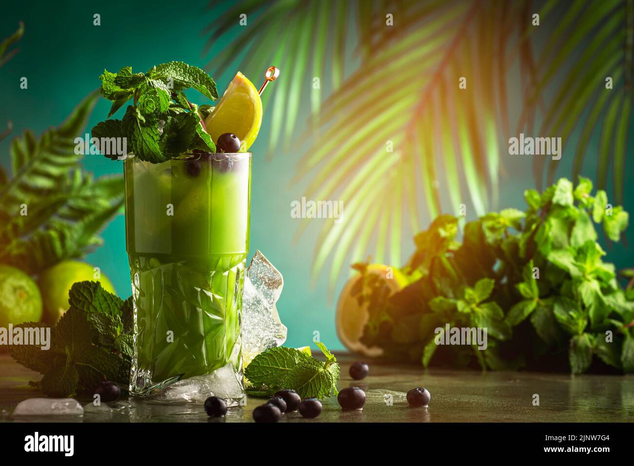 Green alcoholic cocktail with gin, tequila, liquor, juice, lime ...