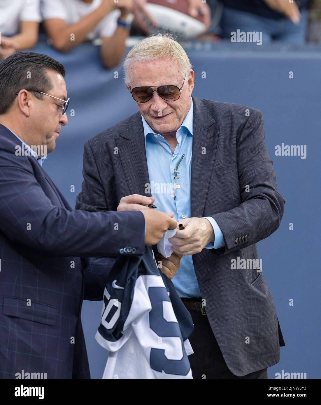 Denver, Colorado, USA. 13th Aug, 2022. Cowboys owner Jerry Jones signs ...