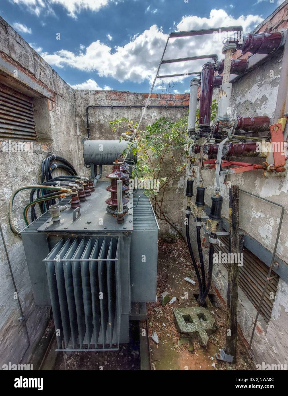Disused and broken transformer in a ruin Stock Photo - Alamy
