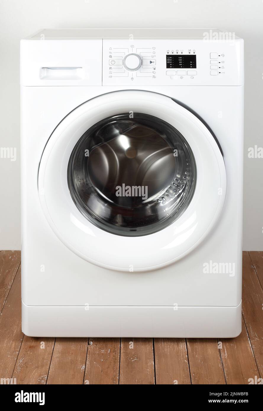 Major appliance - Front view close door washing machine on a white and ...