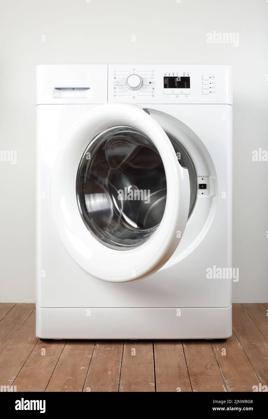 Major appliance - Front view open door washing machine on a white and ...