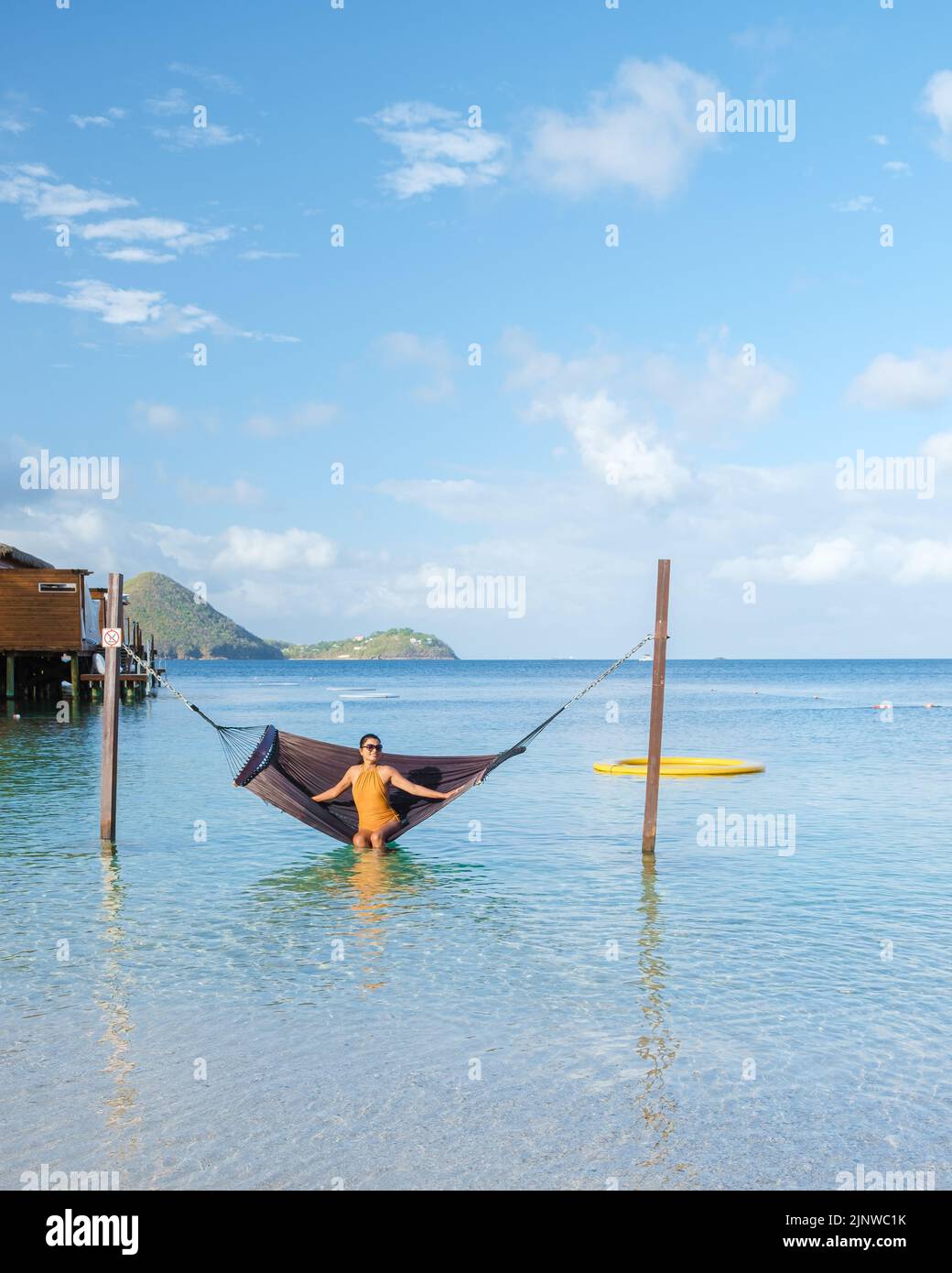 Women on the beach of the tropical Island Saint Lucia or St Lucia ...