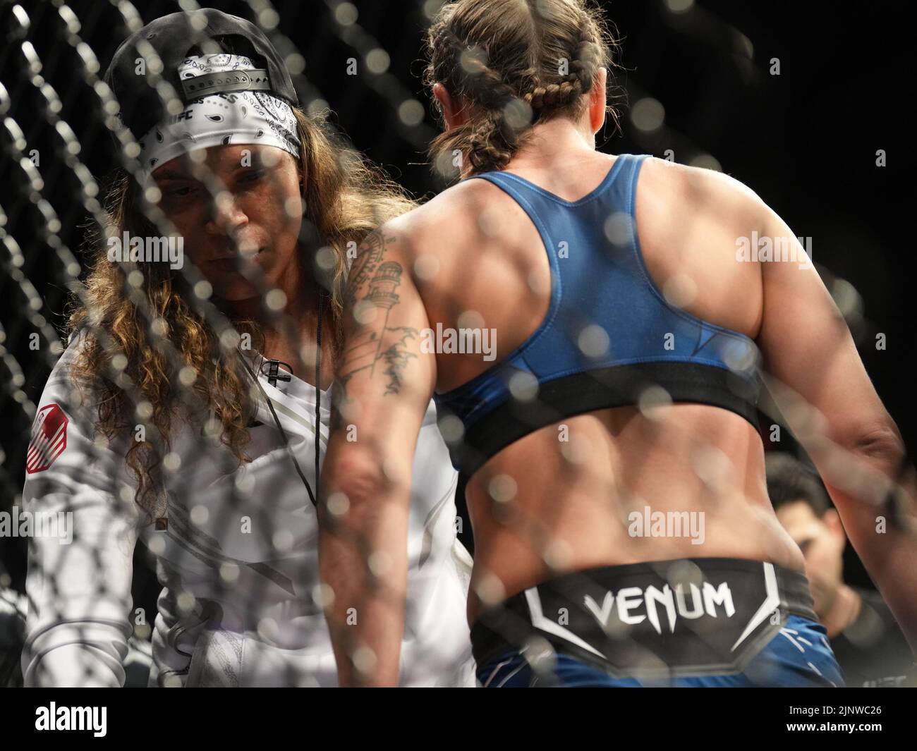 SAN DIEGO, CA - AUGUST 13: (L-R) Amanda Nunes helps Nina Nunes during ...
