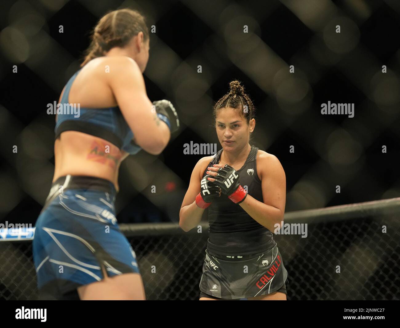 SAN DIEGO, CA - AUGUST 13: (R-L) Cynthia Calvillo battles Nina Nunes in ...