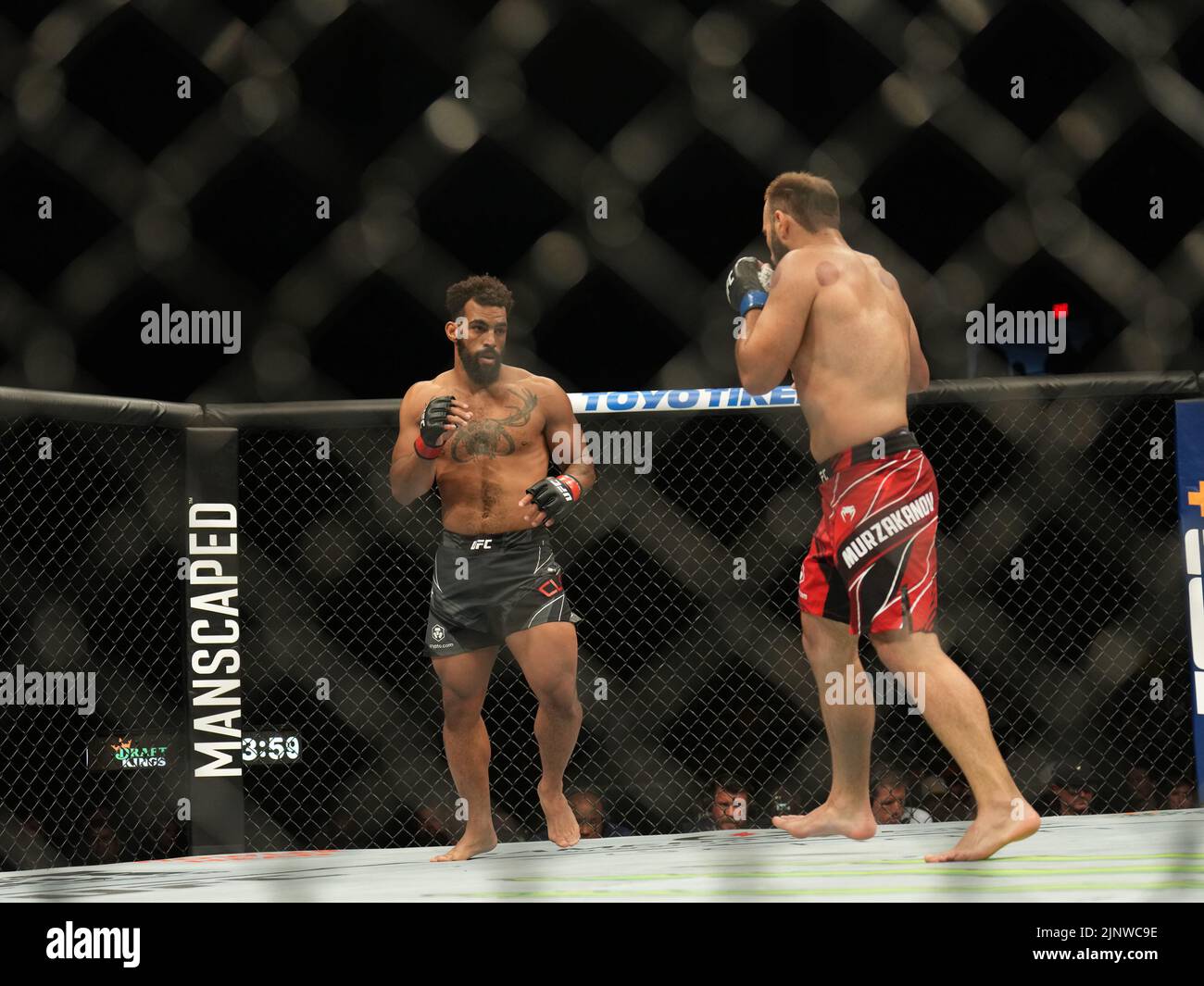 SAN DIEGO, CA - AUGUST 13: (L-R) Devin Clark battles Azamat Murzakanov ...