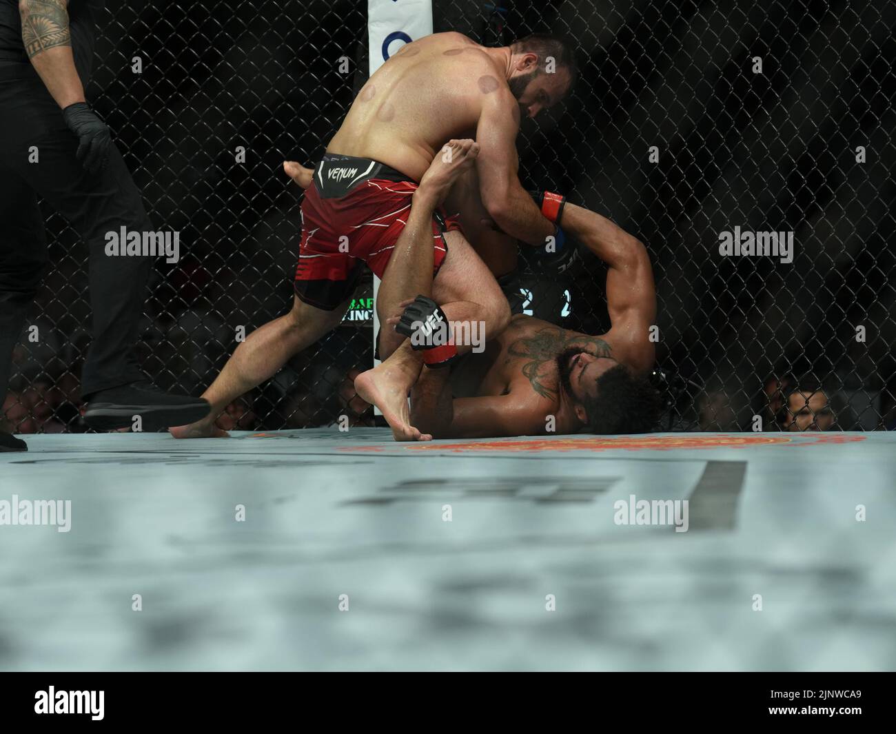 SAN DIEGO, CA - AUGUST 13: (L-R) Azamat Murzakanov controls the body of ...