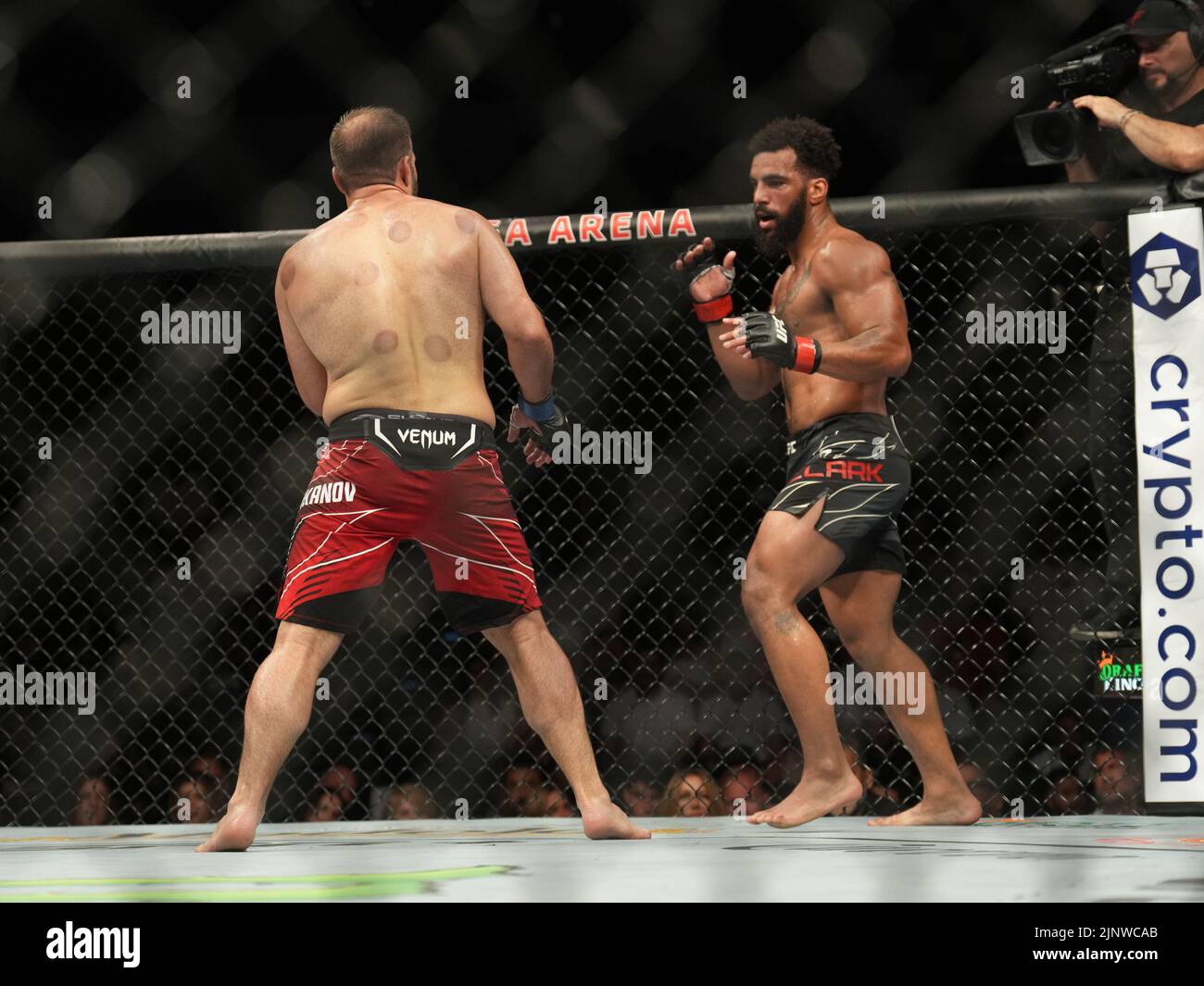 SAN DIEGO, CA - AUGUST 13: (L-R) Azamat Murzakanov battles Devin Clark ...