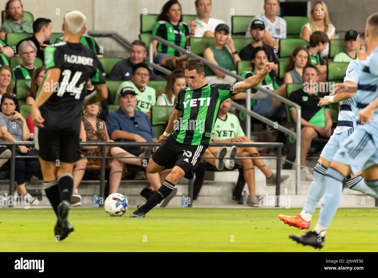 AUSTIN, TX - AUGUST 13: Austin FC midfielder Ethan Finlay (13) moves ...
