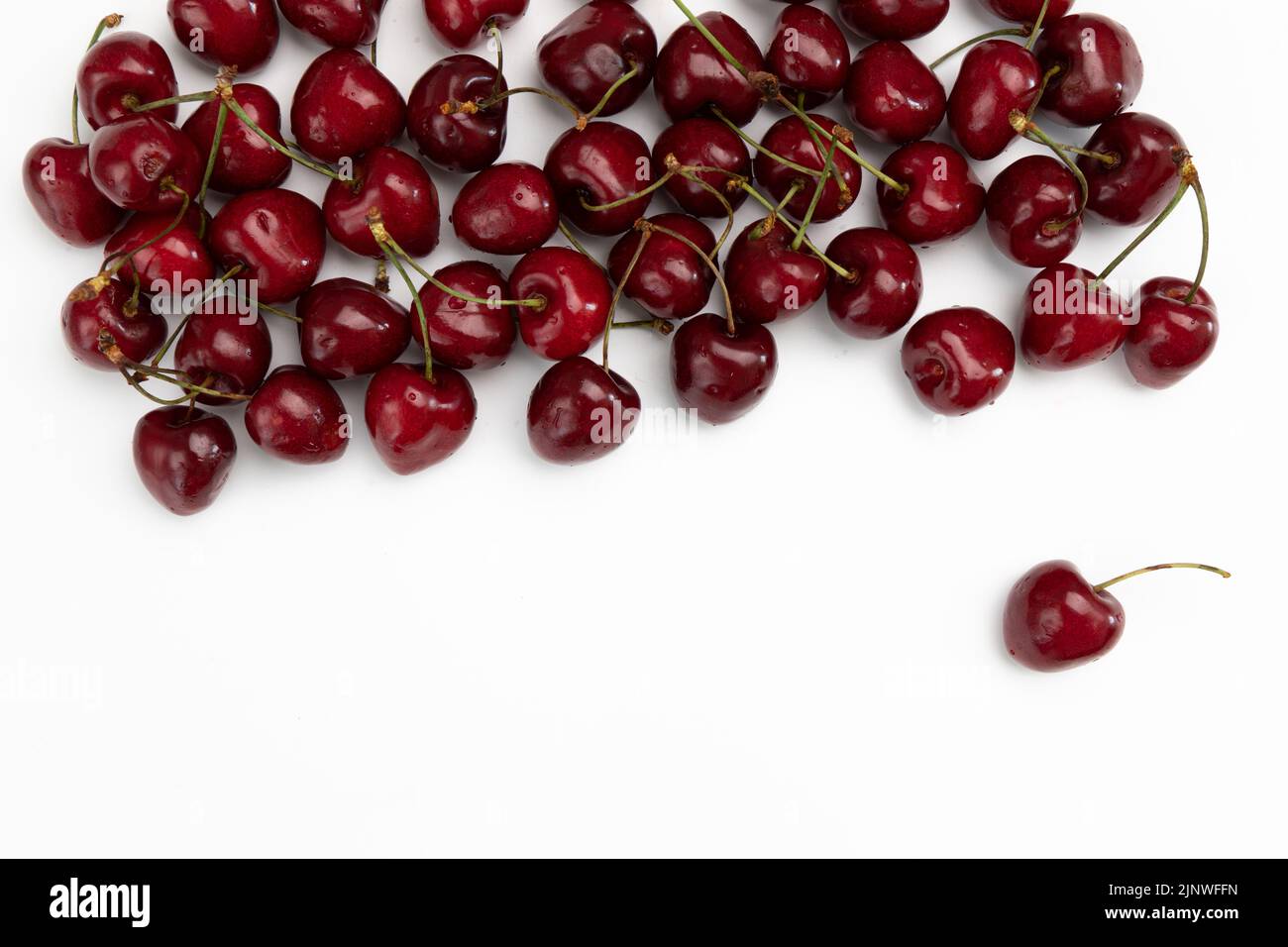 frame of ripe sweet cherries with empty space for text isolated on ...