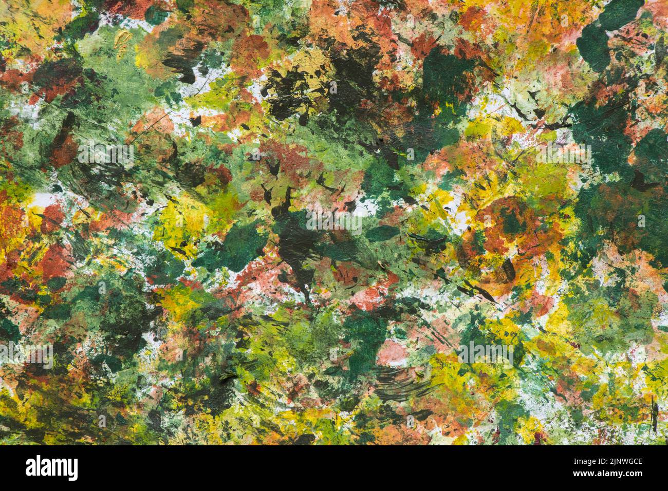 Green and yellow spots painted on paper with paint, camouflage ...