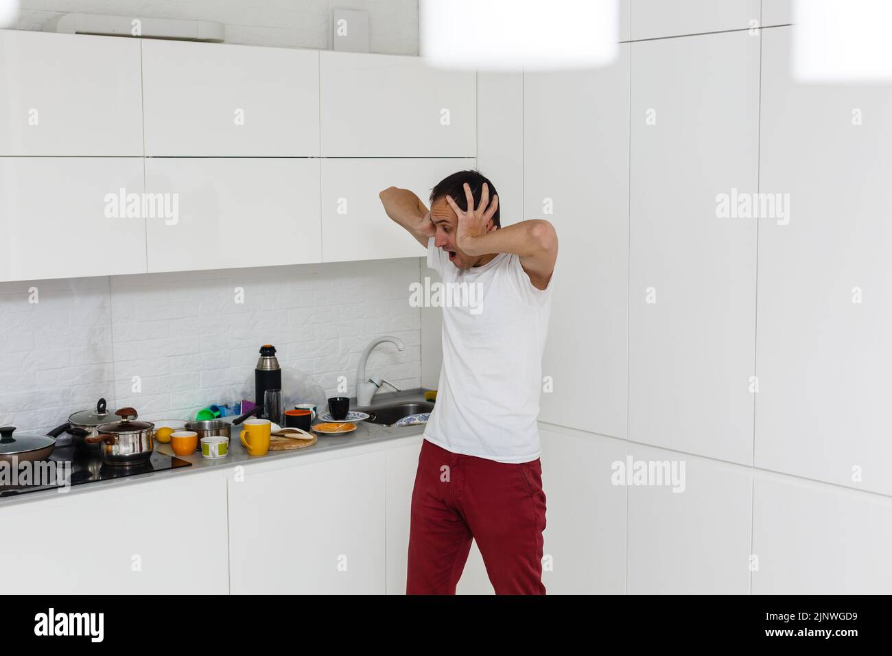 Dirty kitchen and frustrated and man hi-res stock photography and ...