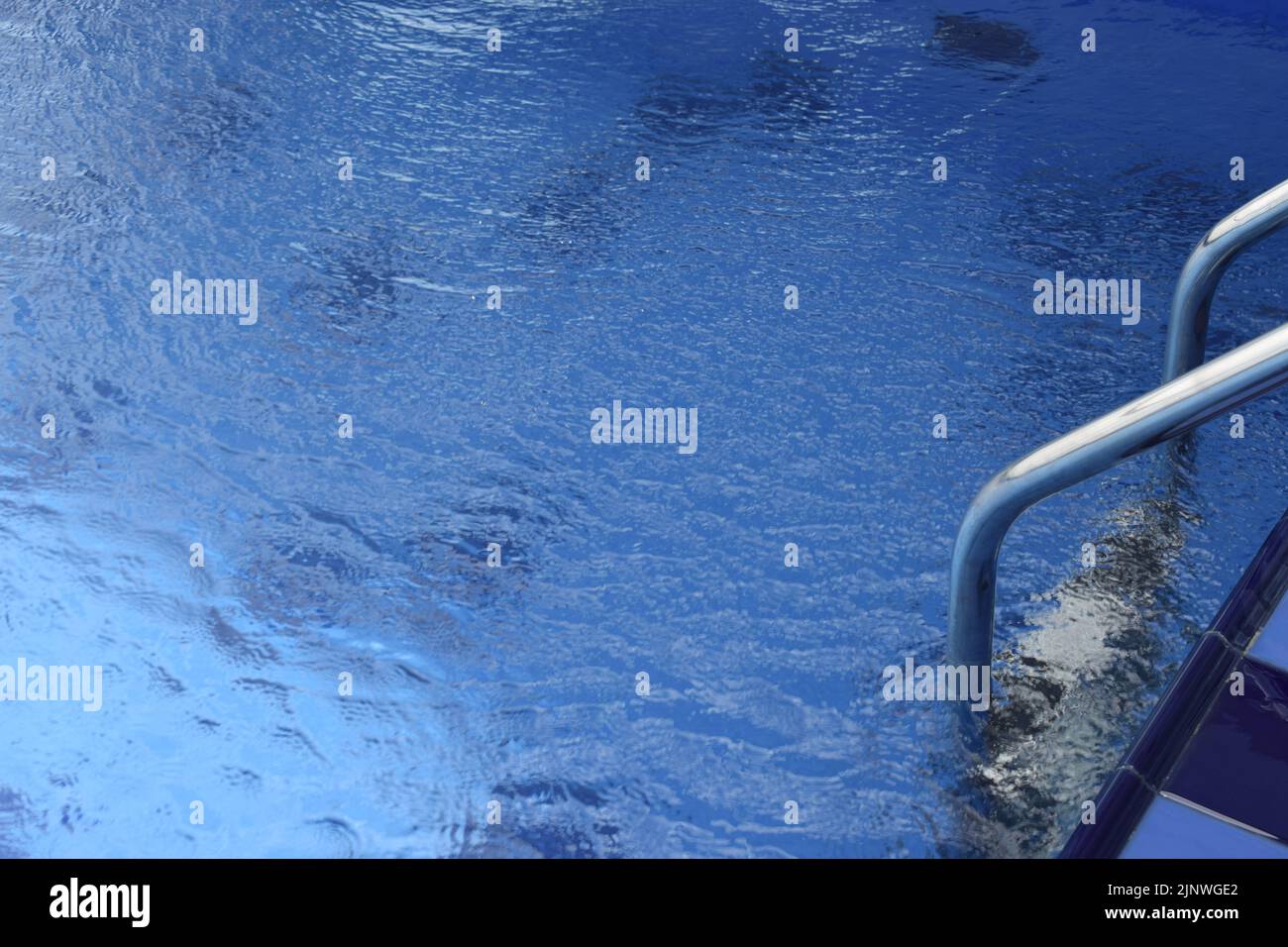 Blue swimming pool water ripples Stock Photo - Alamy