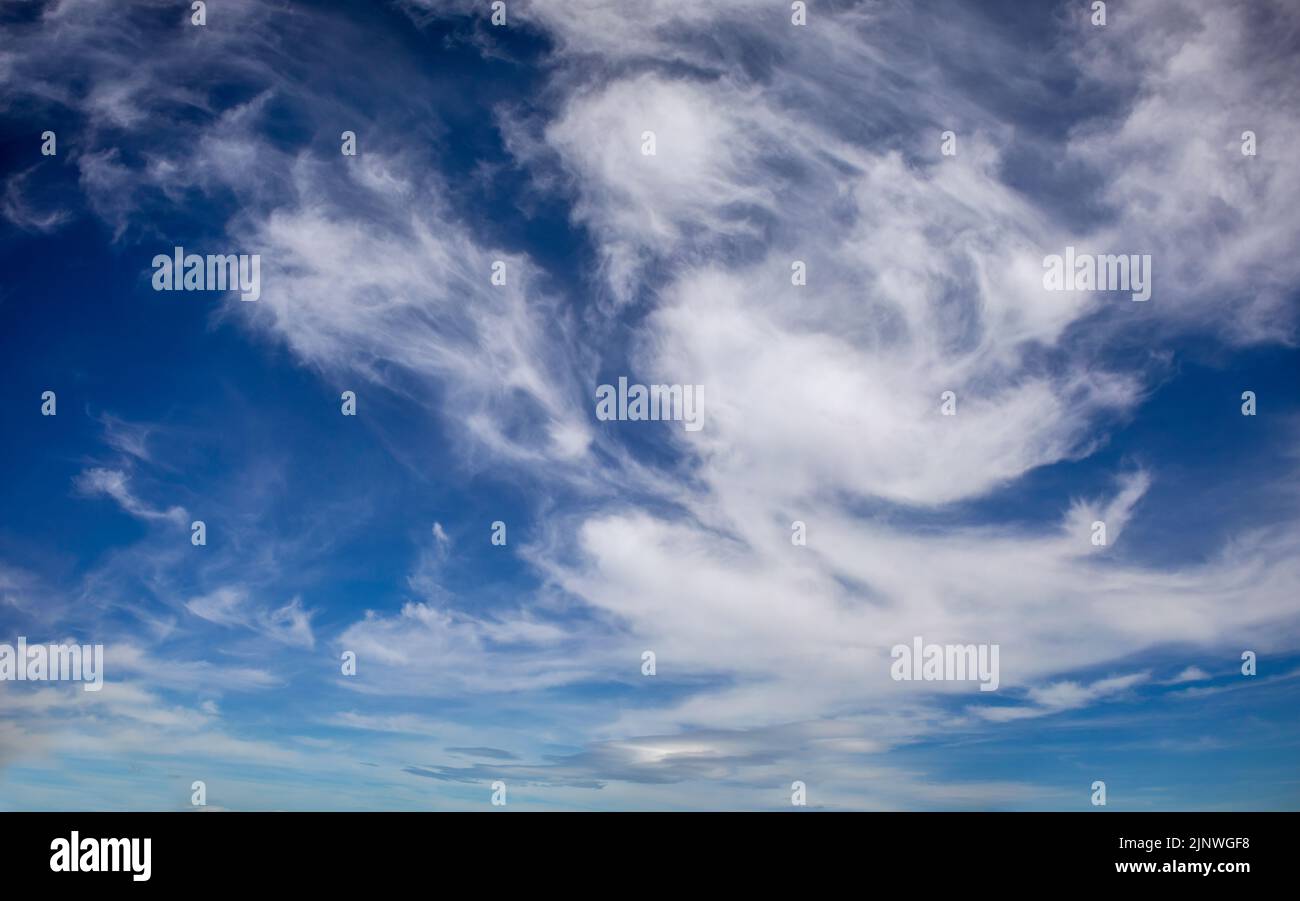 Intense and luminous blue sky with white and soft cirrus clouds perfect ...
