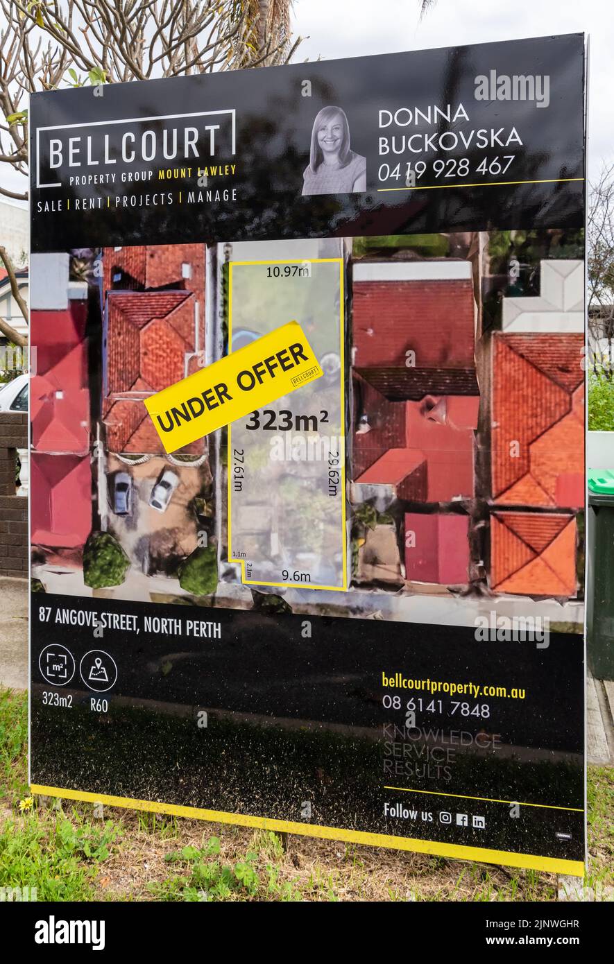 For sale sign on Australian property with under offer sticker Stock ...