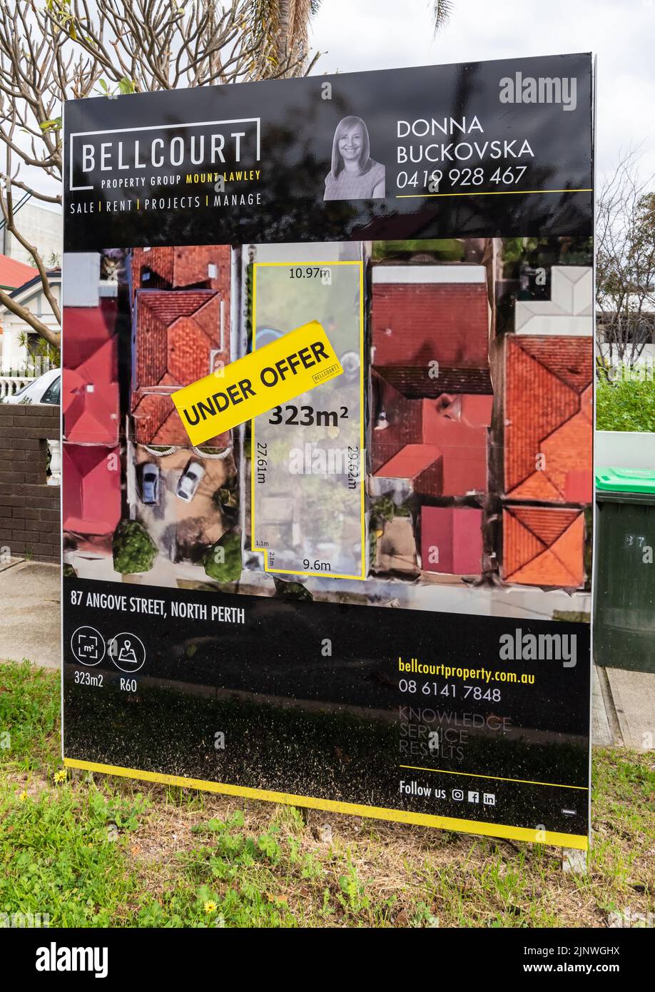 For sale sign on Australian property with under offer sticker Stock ...