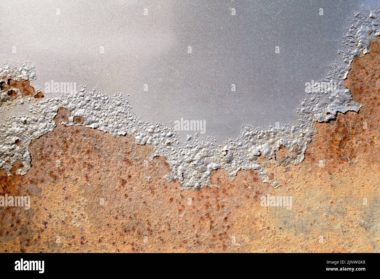 Closeup of damaged grunge dirty texture from road salt. Sheet metal ...