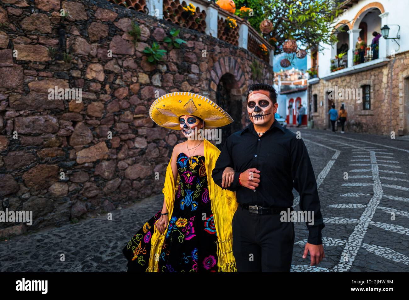 A young Mexican couple, dressed as La Catrina and Catrin, takes part in ...