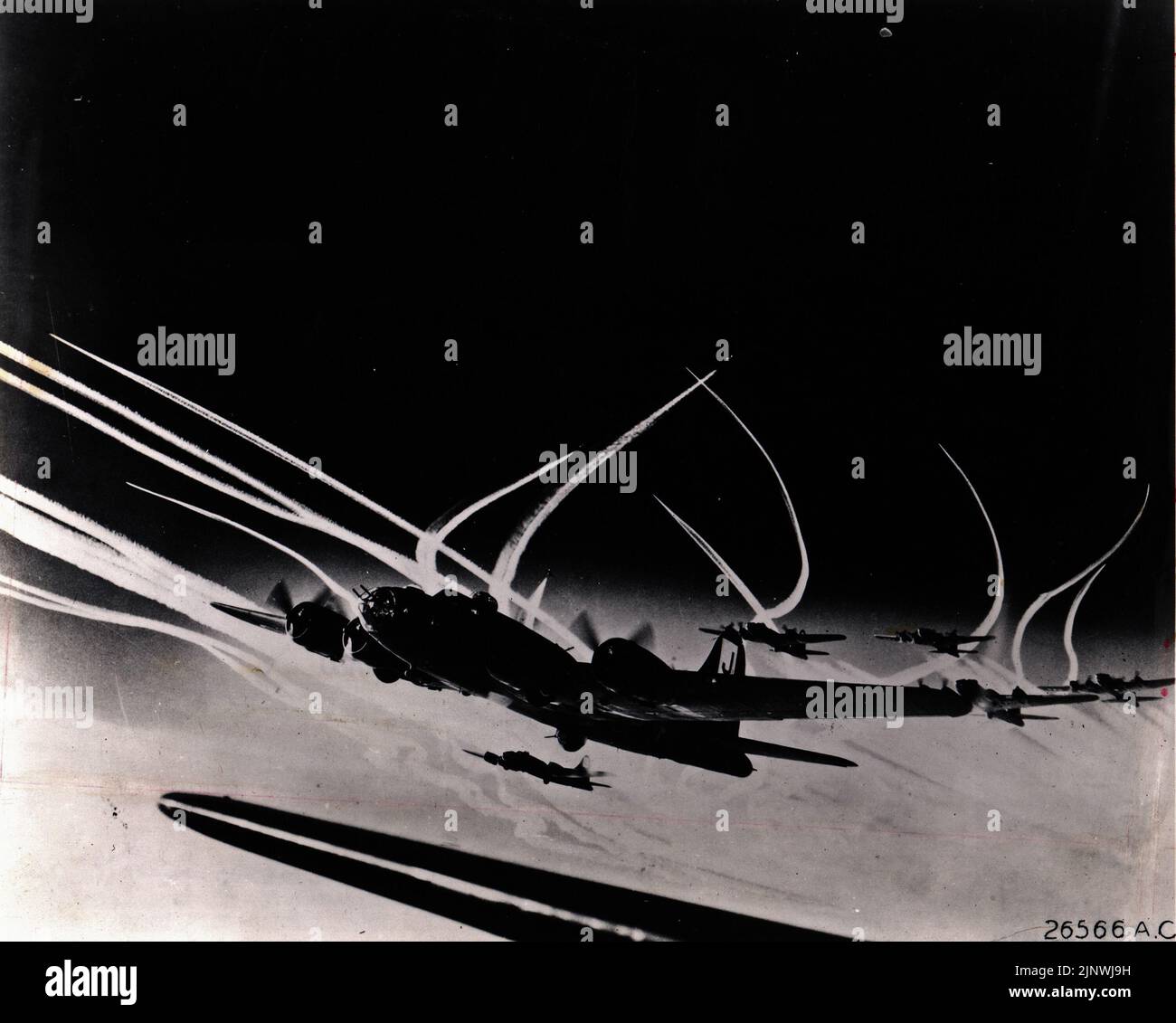 Three-quarter left front view from below of a formation of Boeing B-17F ...