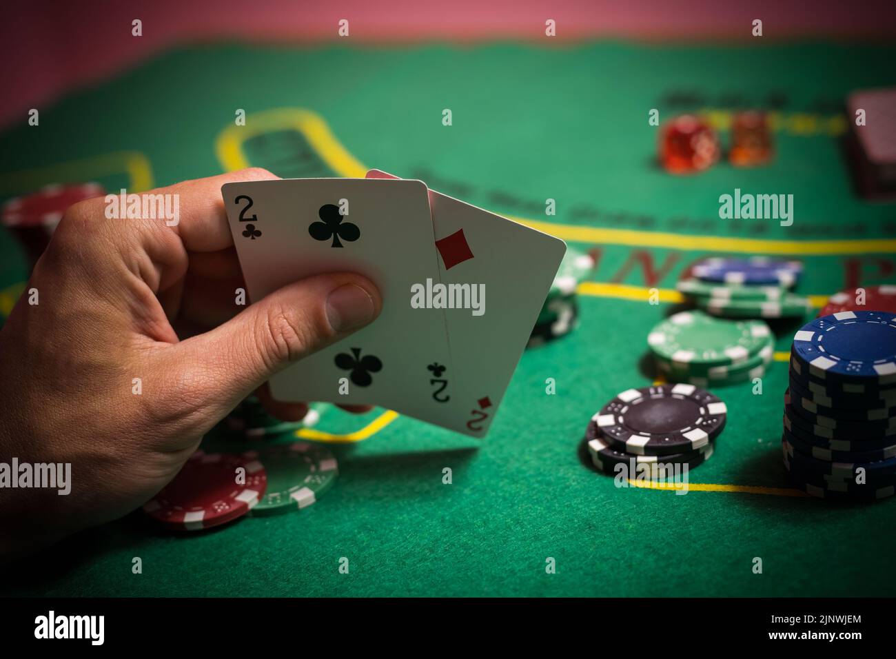 man playing blackjack at the table Stock Photo - Alamy