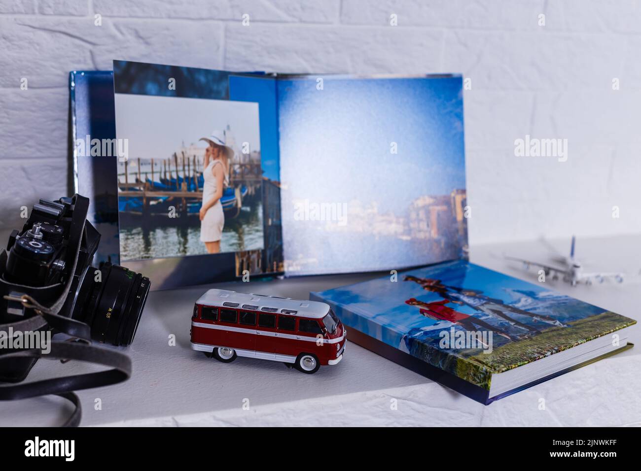 Photobook Album with Travel Photo with toy bus and plane. photo book ...