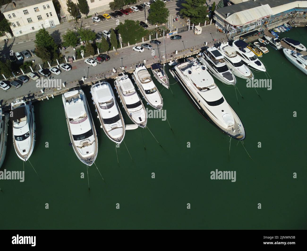 Aerial panoramic view of Balaklava landscape with boats and sea in ...