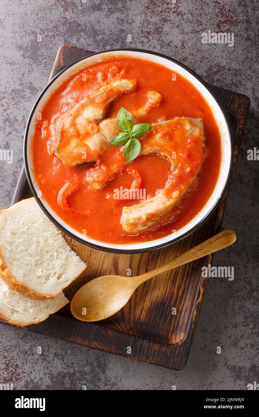 Traditional Hungarian fish soup Halaszle is bright red and is ...