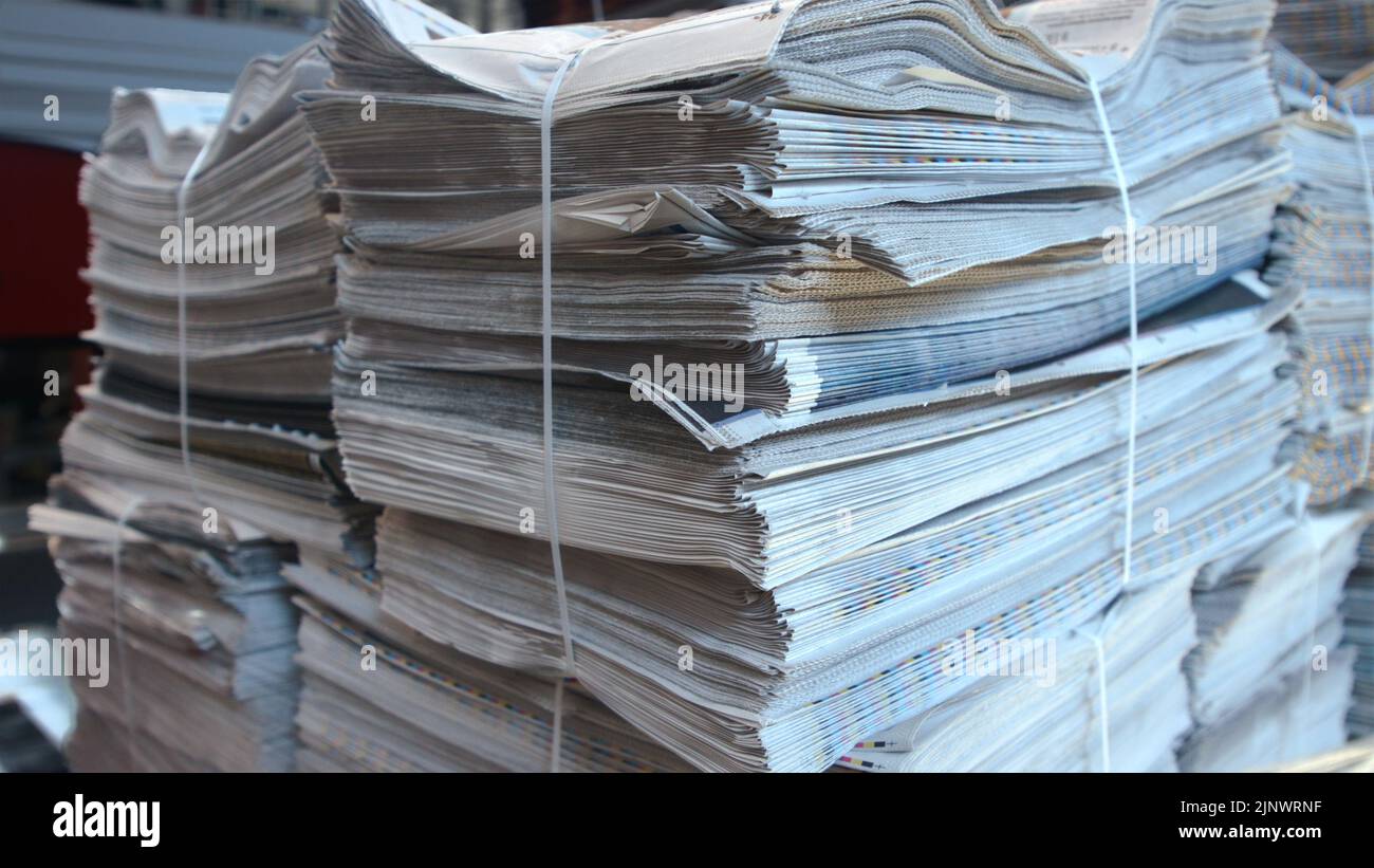 Stacks of newspapers Stock Photo - Alamy