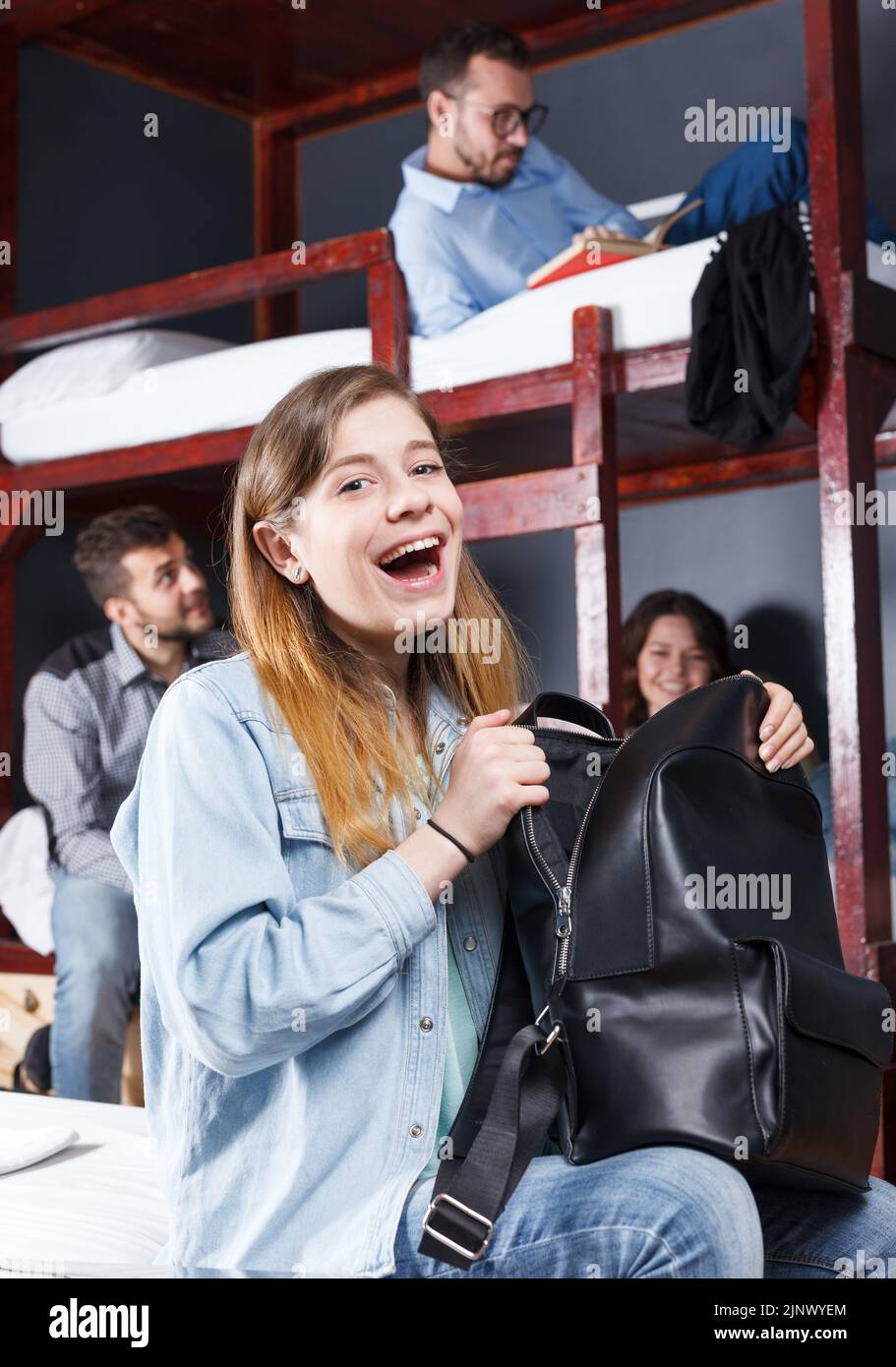 Happy girl with knapsack Stock Photo - Alamy