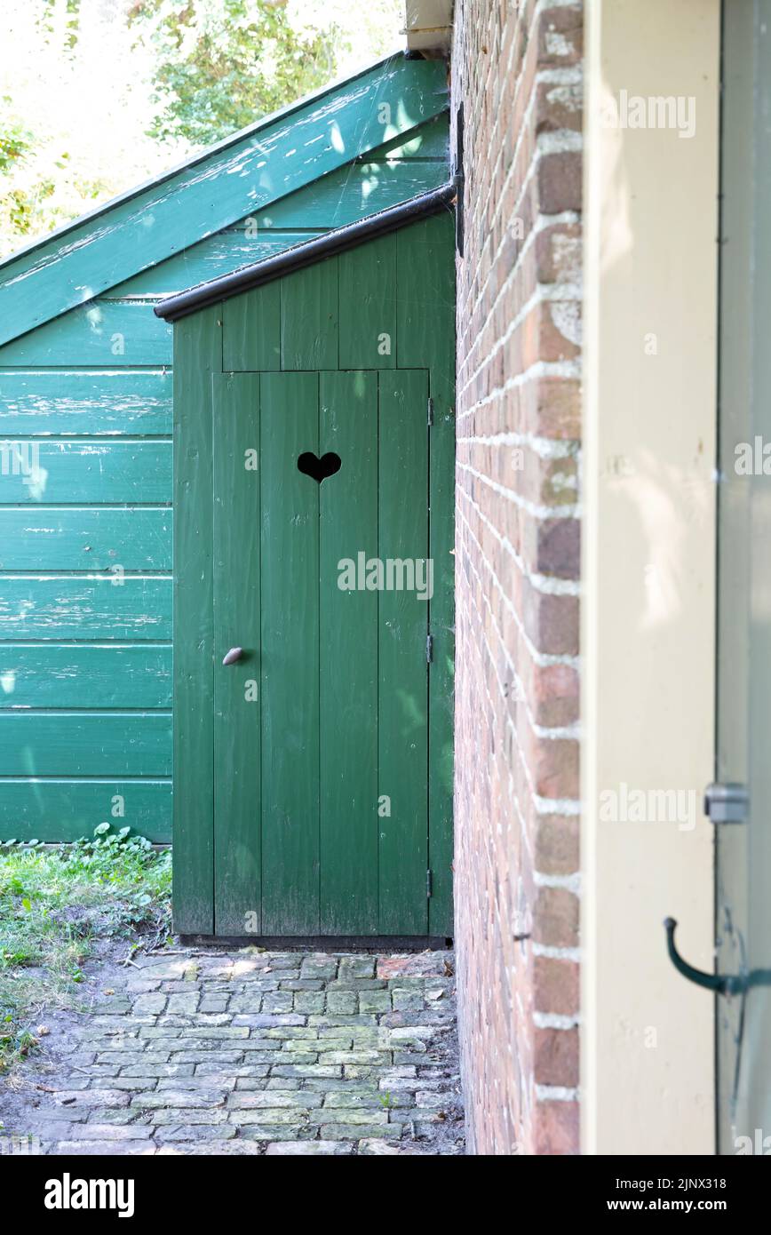 Old toilet outside in the garden, the Netherlands Stock Photo - Alamy